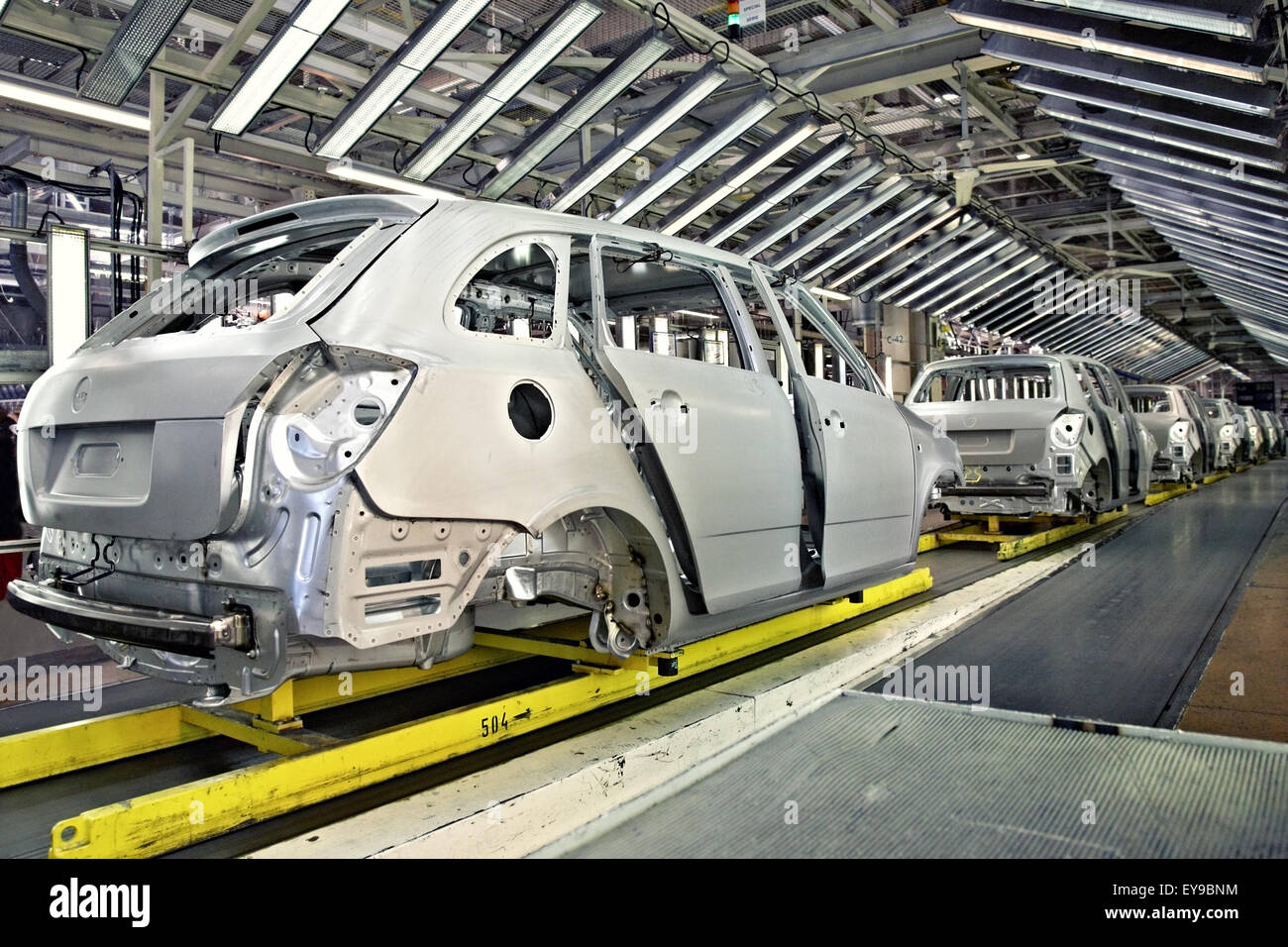 cars in a row at car plant Stock Photo - Alamy