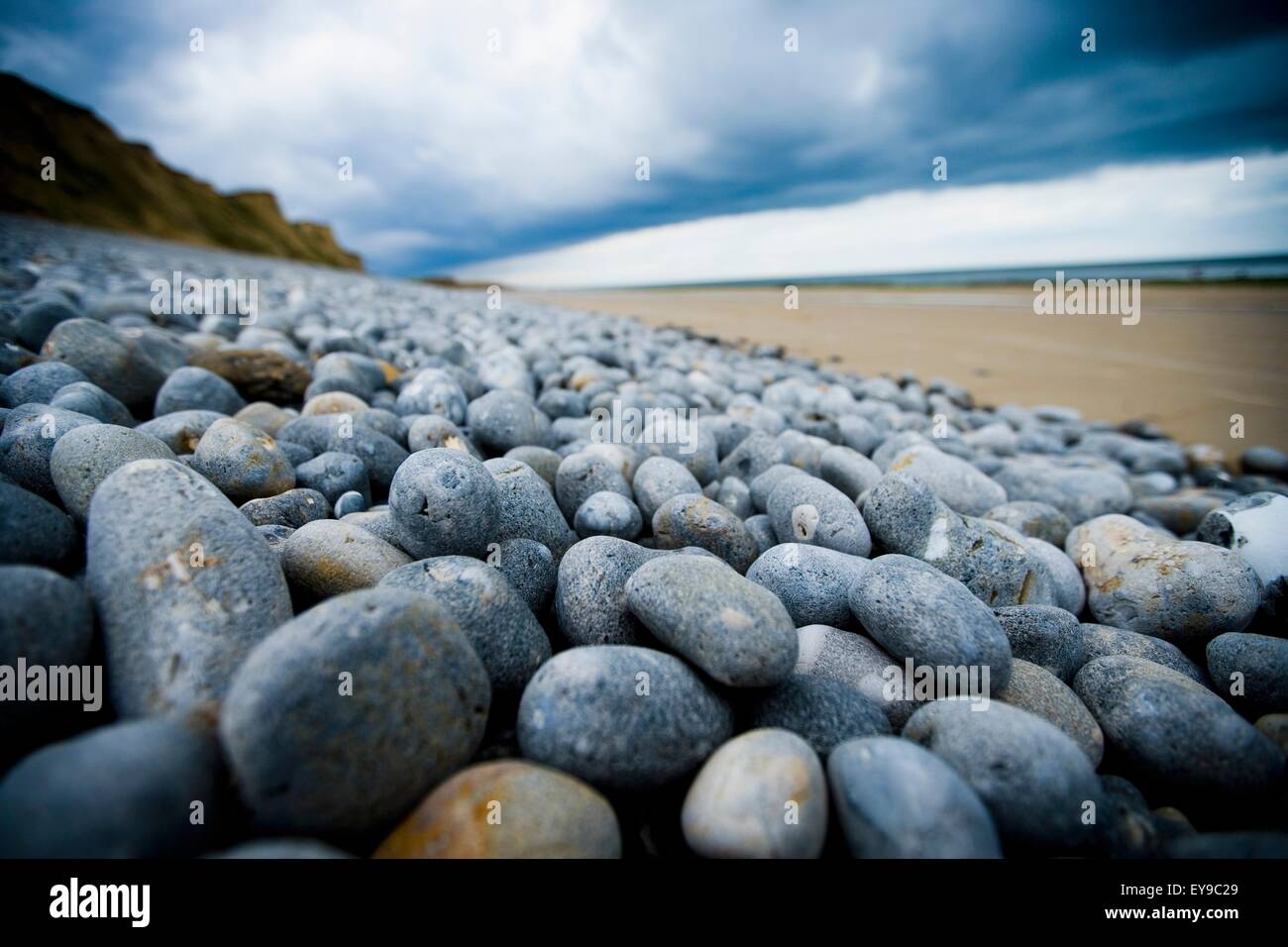Pebble And Sand Split Beach Stock Photo - Alamy