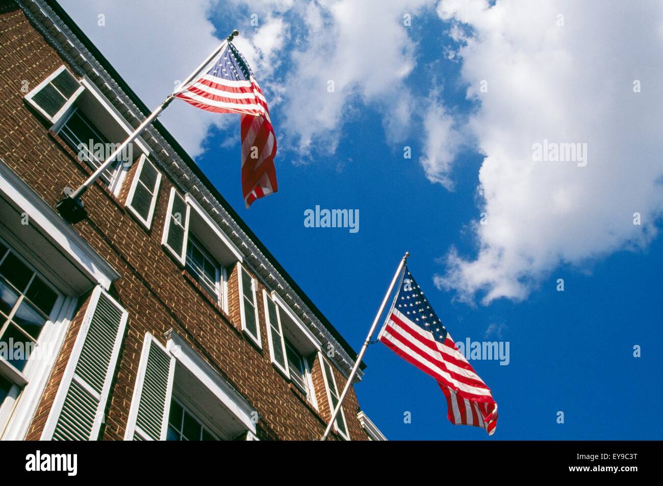American Flags Hanging On Building Stock Photo - Alamy