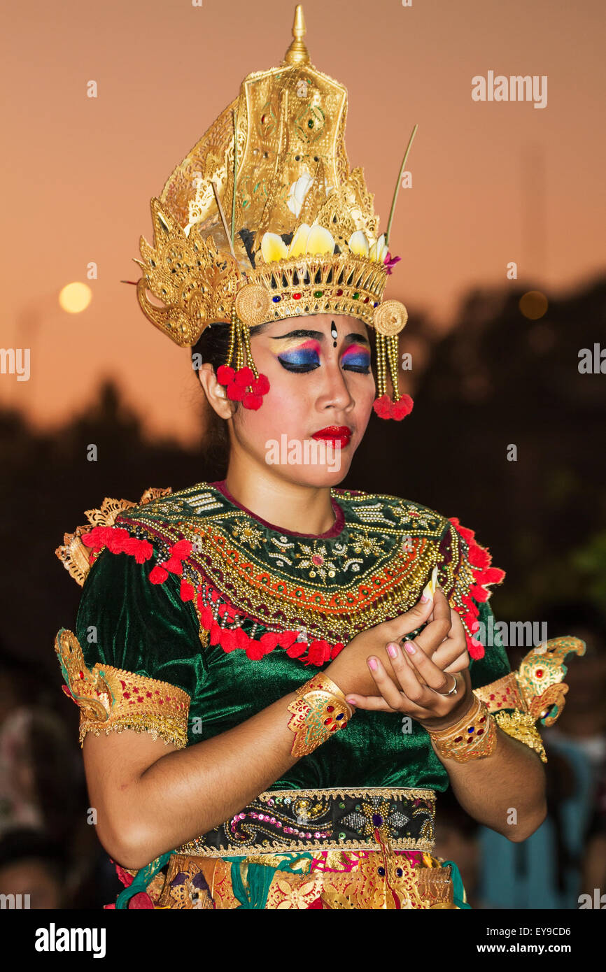 Balinese dancer using codified hand positions and gestures during a ...