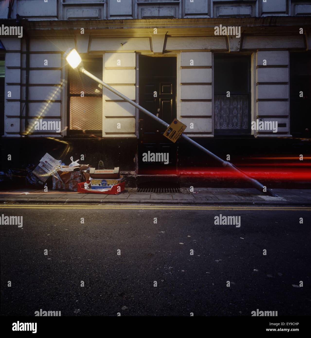 Rubbish On Pavement In Street Stock Photo - Alamy