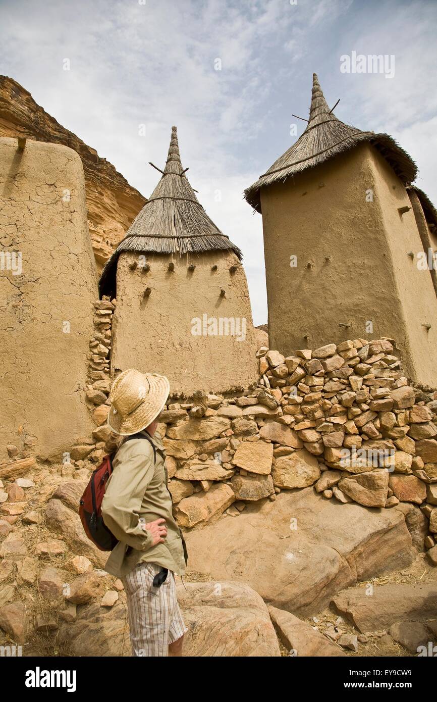 Tourist Walking Among Dogon Village Buildings Stock Photo - Alamy