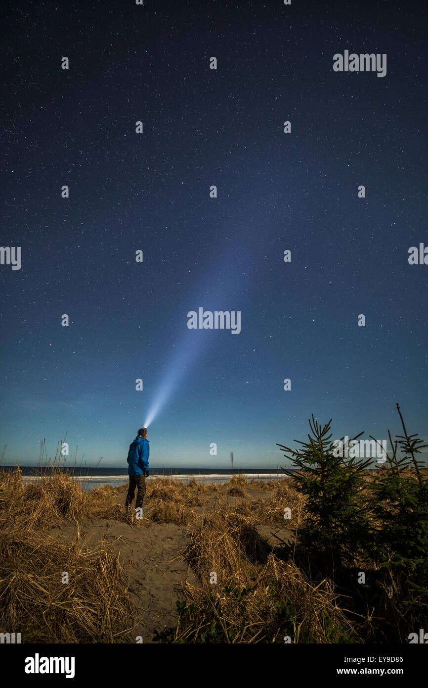Person shining a torch hi-res stock photography and images - Alamy