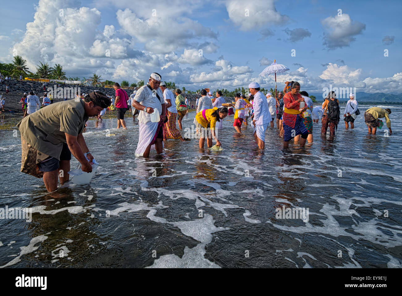 When the procession of taking holy water is over, devotees perform ...