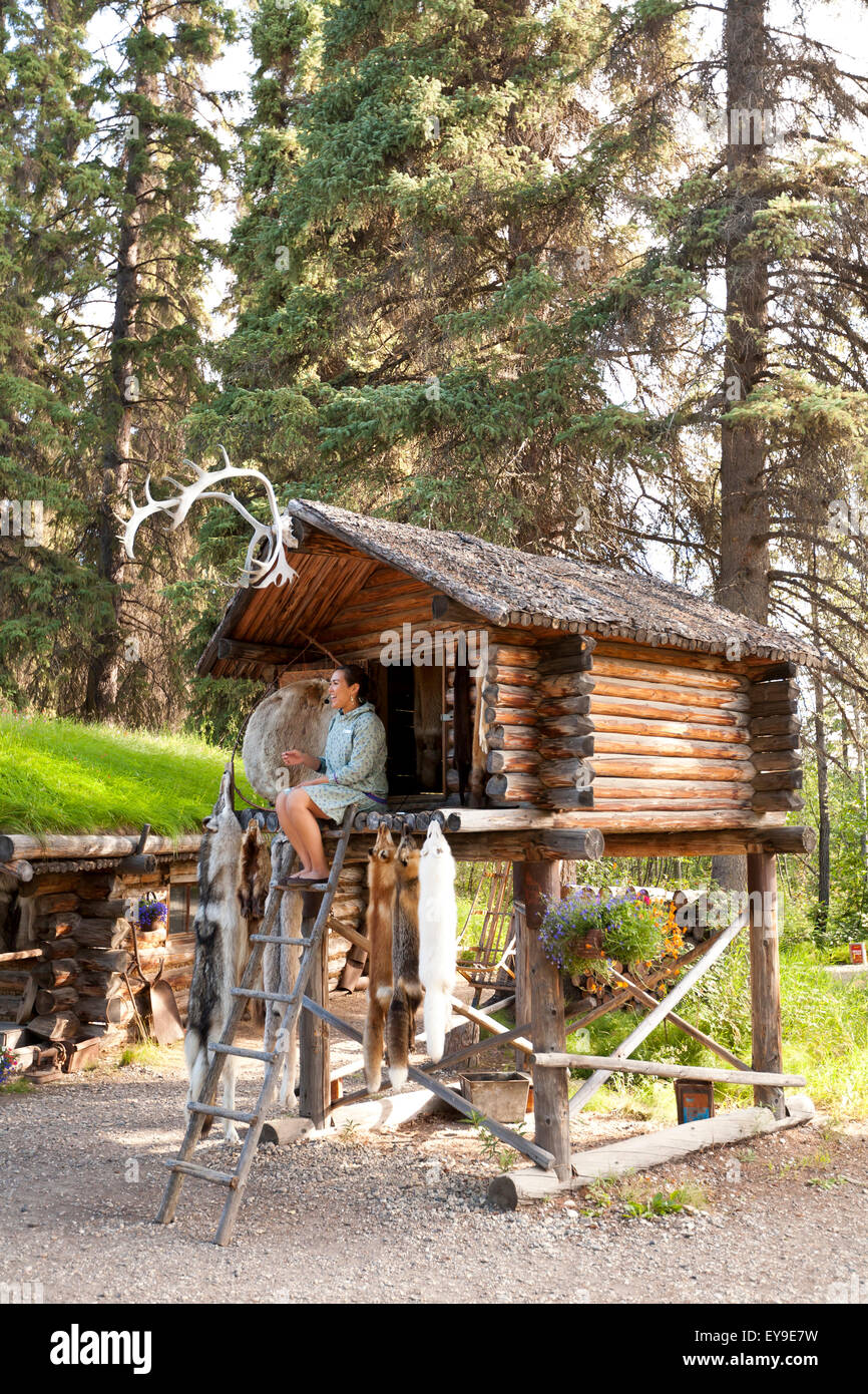 Woman Sitting Outside Log Cabin High Resolution Stock Photography and ...