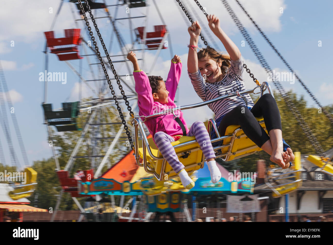 Fairground swing ride children hi-res stock photography and images - Alamy