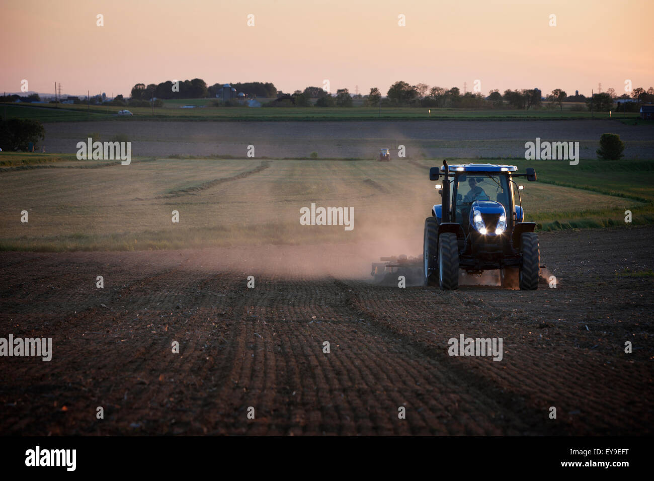 Disking field at sunset; New Holland, Pennsylvania, United States of ...