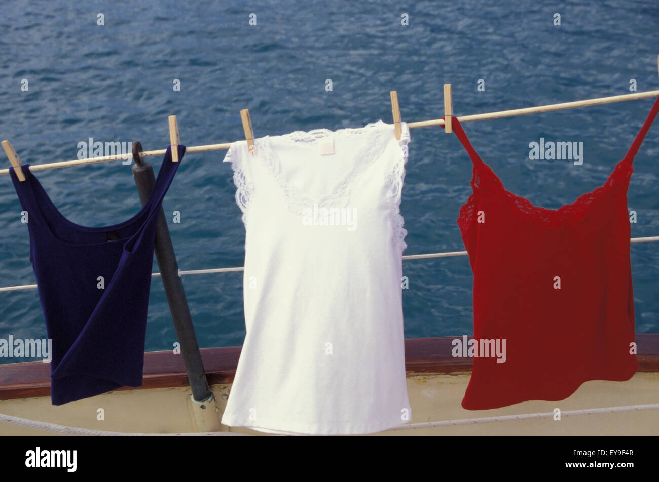 Clothes Drying On The Side Of A Boat Stock Photo - Alamy