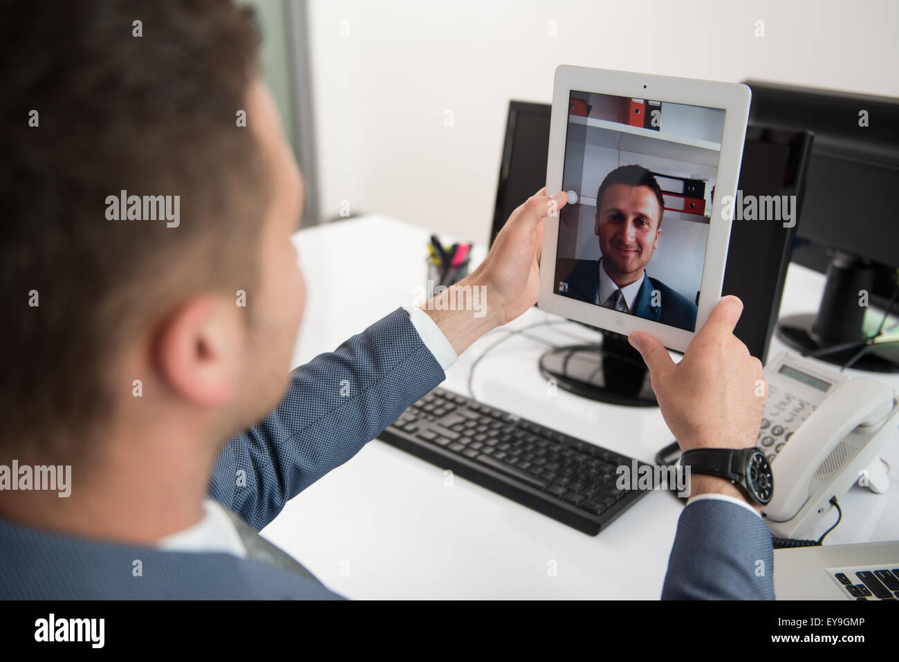 Happy Young Business Men Work In Modern Office On Computer Stock Photo ...