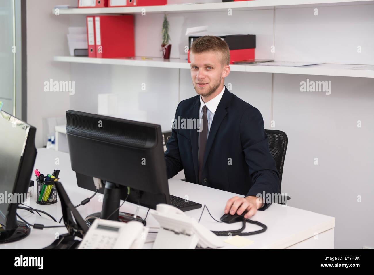 Happy Young Business Man Work In Modern Office On Computer Stock Photo ...