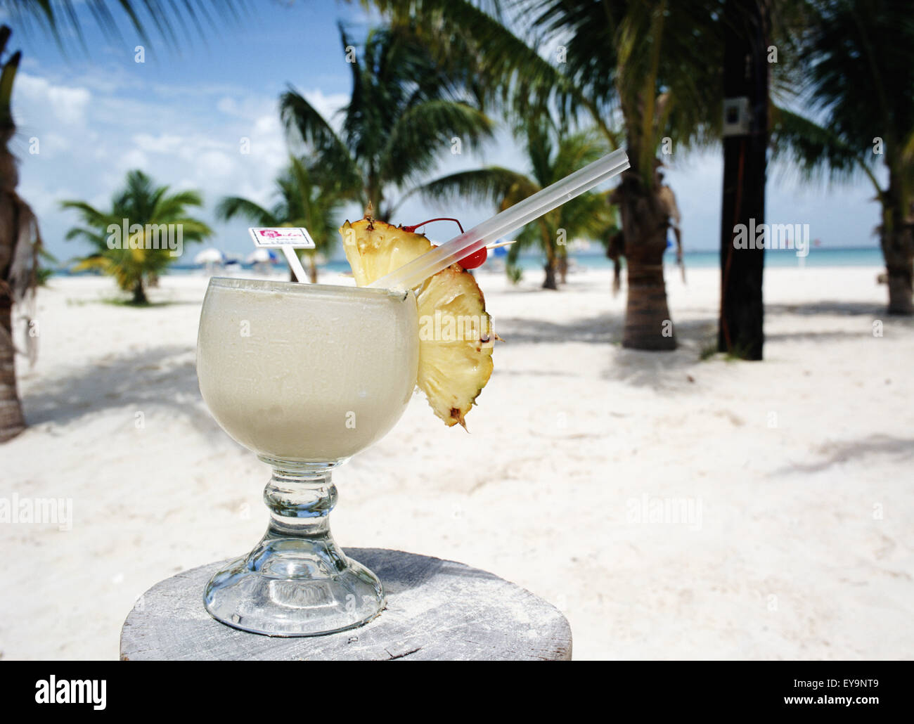 Pina Colada On The Beach Stock Photo - Alamy