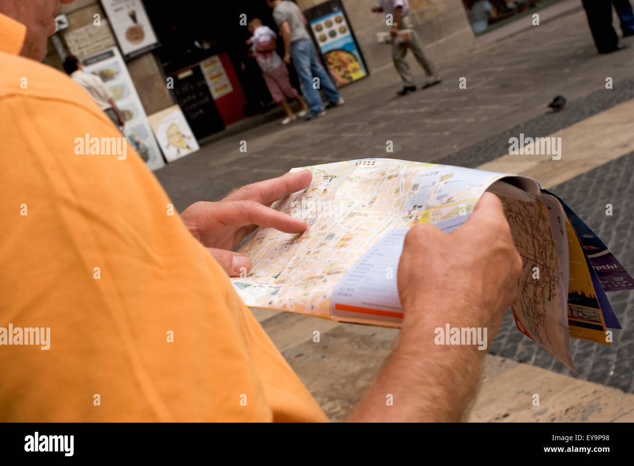 Man Looking At A Street Map Stock Photo - Alamy