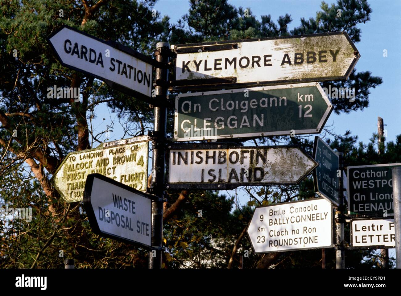Low Angle View Of Directional Sign Boards On A Pole, County Galway ...