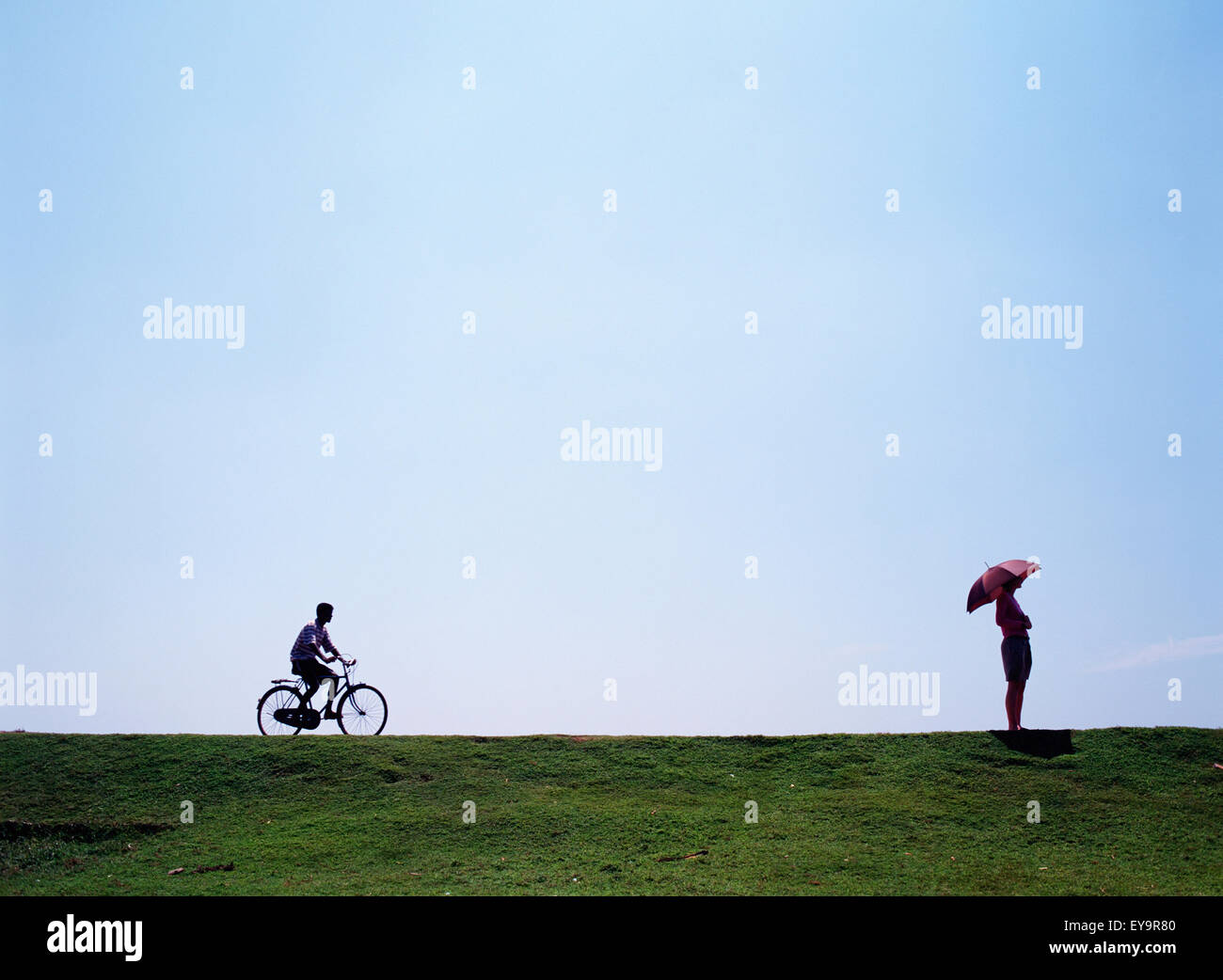 Man with parasol hi-res stock photography and images - Alamy
