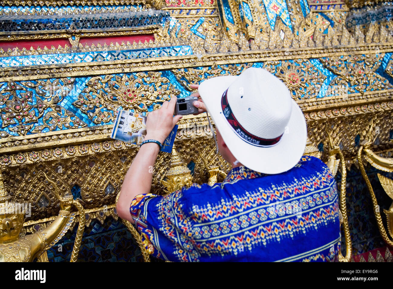 Man Taking Pictures Of Bot Walls Of Wat Phra Kaeo At Grand Palace Stock ...