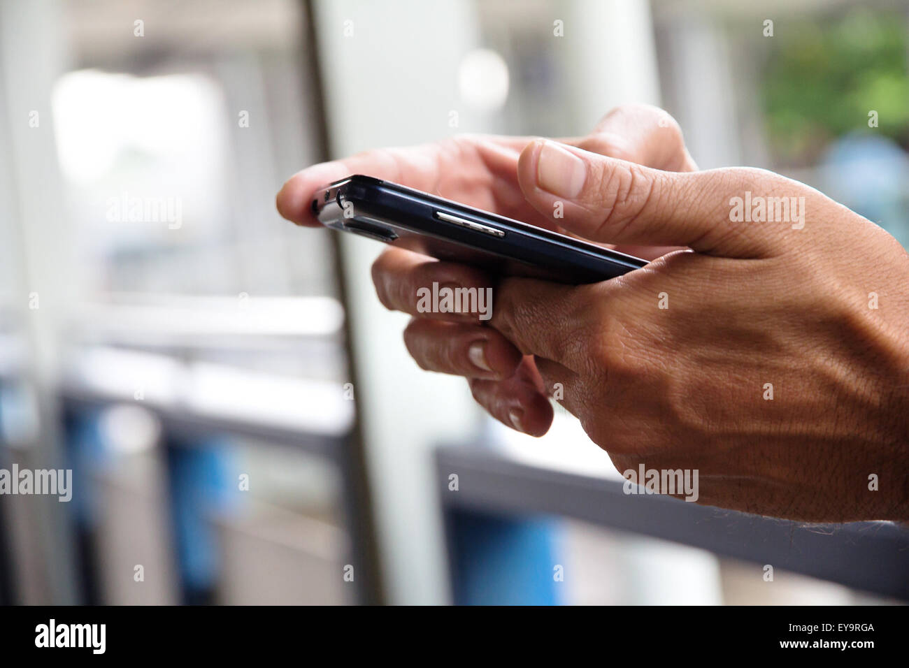man checking his phone Stock Photo - Alamy