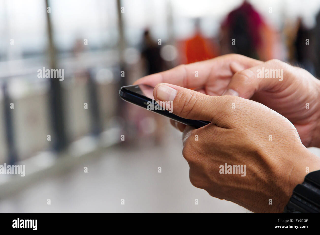 man checking his phone Stock Photo - Alamy