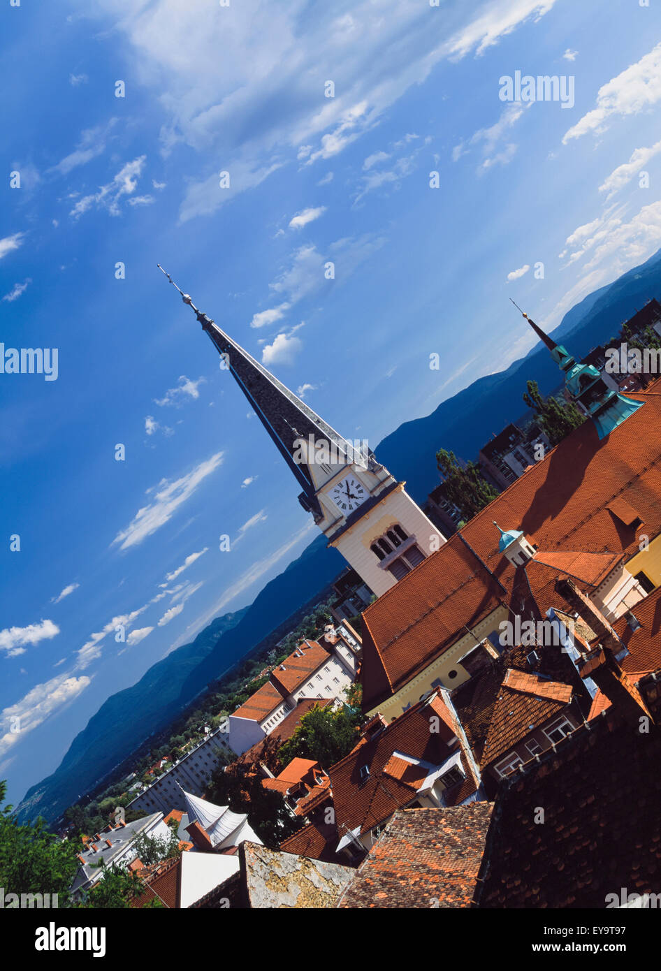 Tilted Angle View Of Church Spire And Roof Tops Stock Photo - Alamy