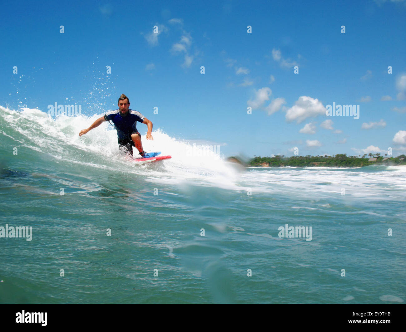 Surfer On Wave, Low Angle View Stock Photo - Alamy