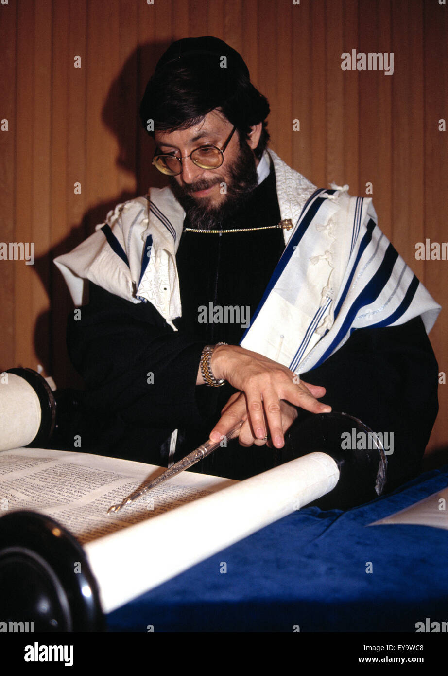 Rabbi Neil Kraft in a Reform synagogue, reading the torah scrolls Stock ...