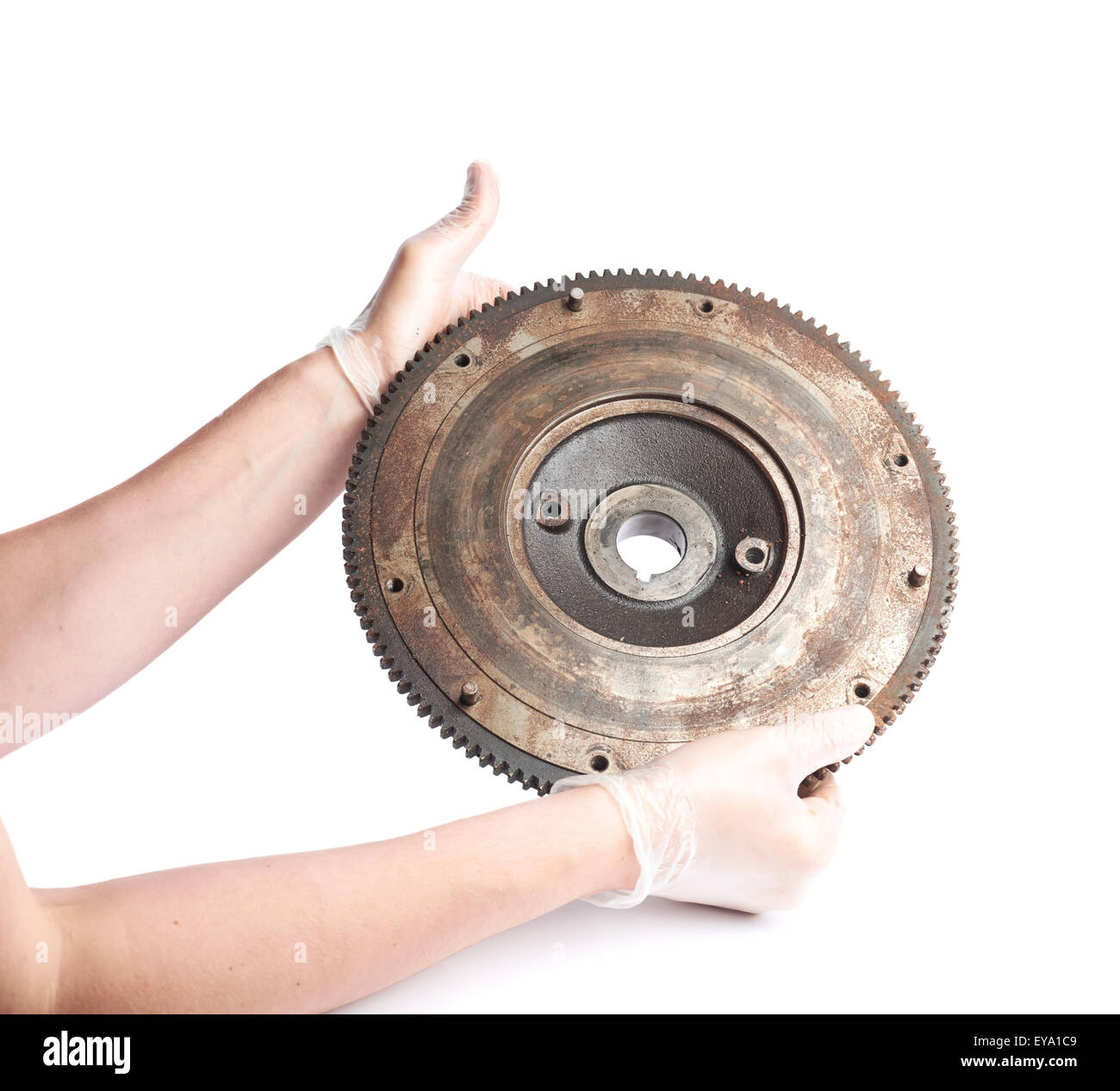Worker's male hands holding engine's fragment Stock Photo - Alamy