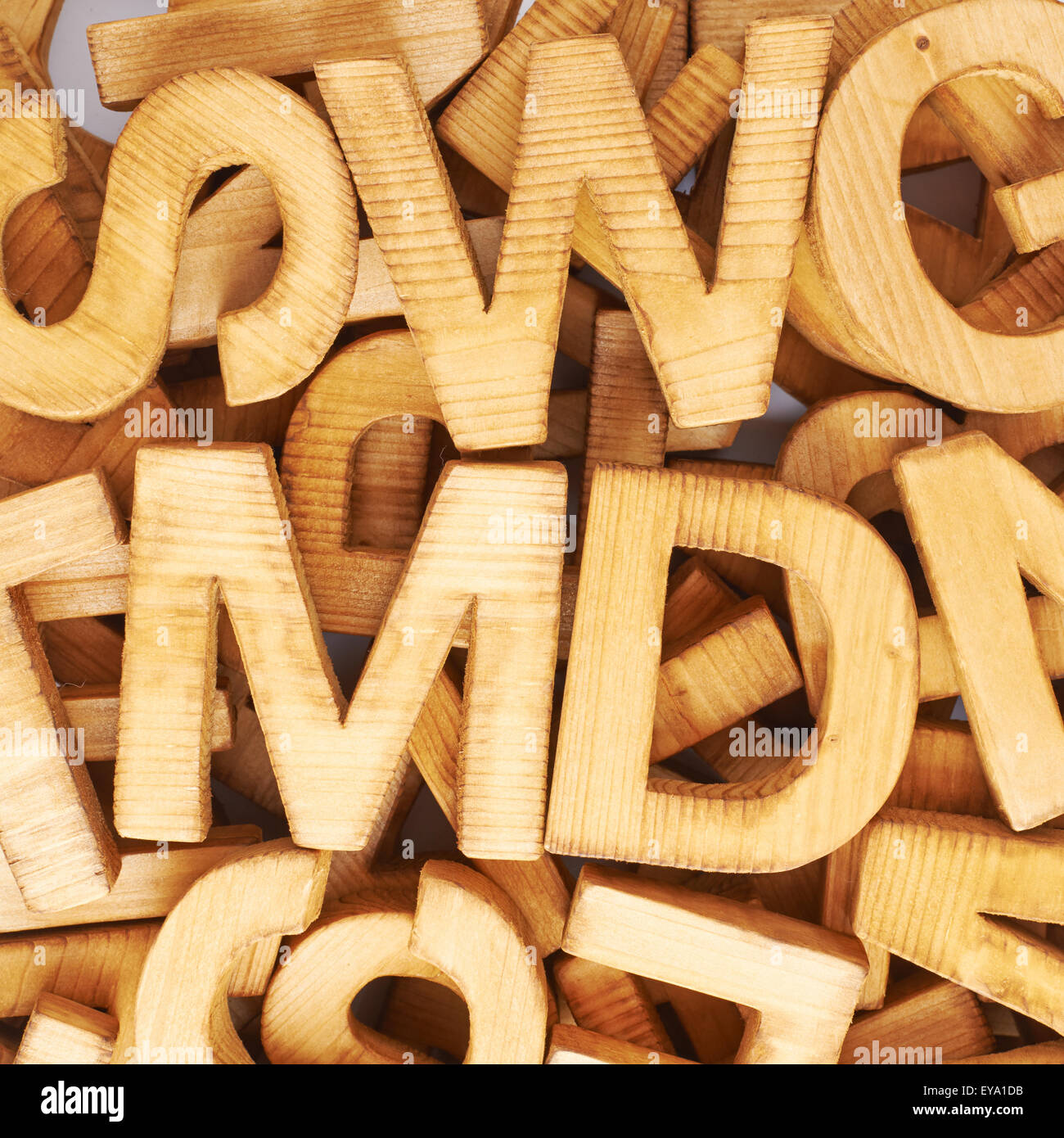 Surface covered with multiple wooden letters Stock Photo - Alamy