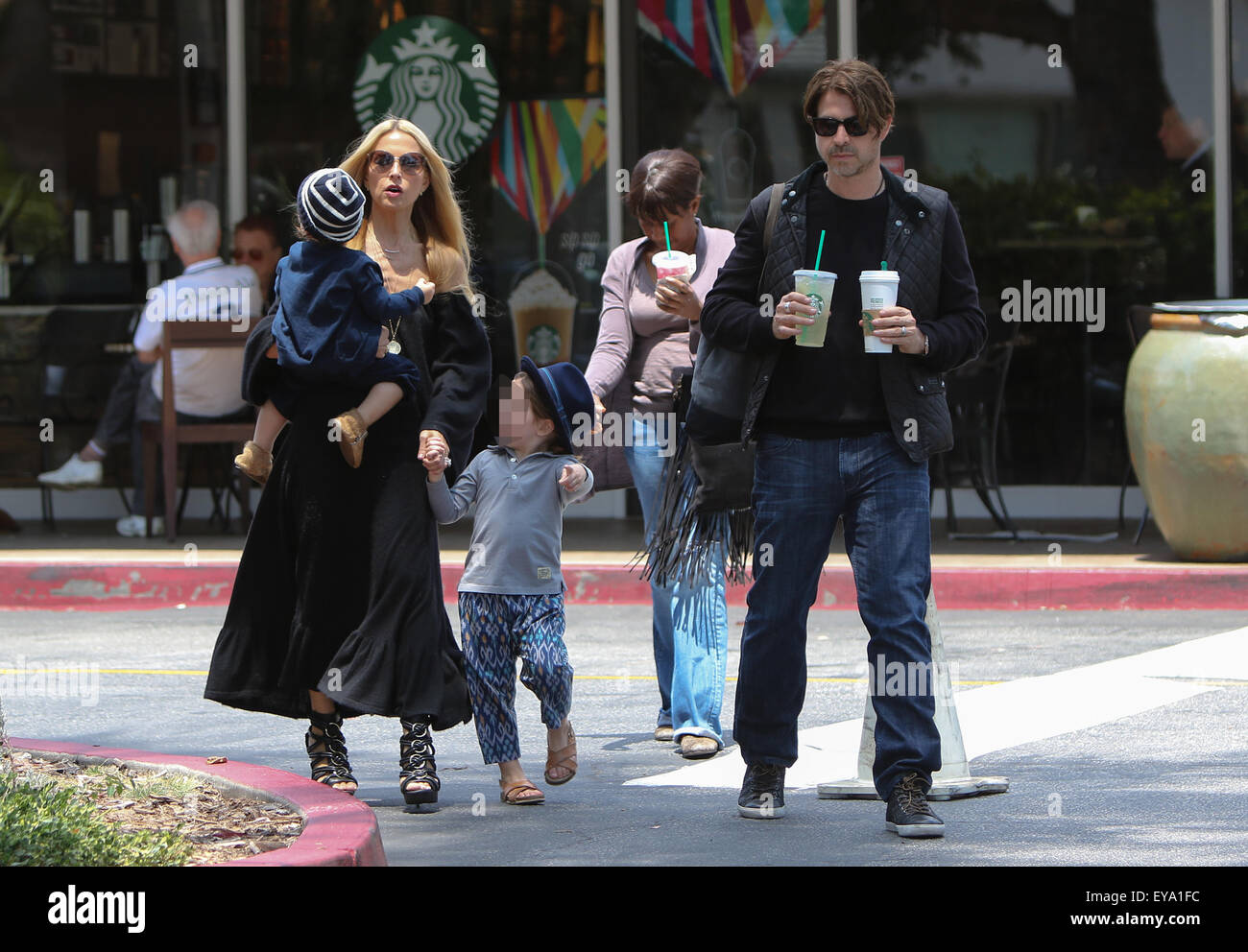 Rachel Zoe visits a Starbucks with her husband Rodger Berman and their ...