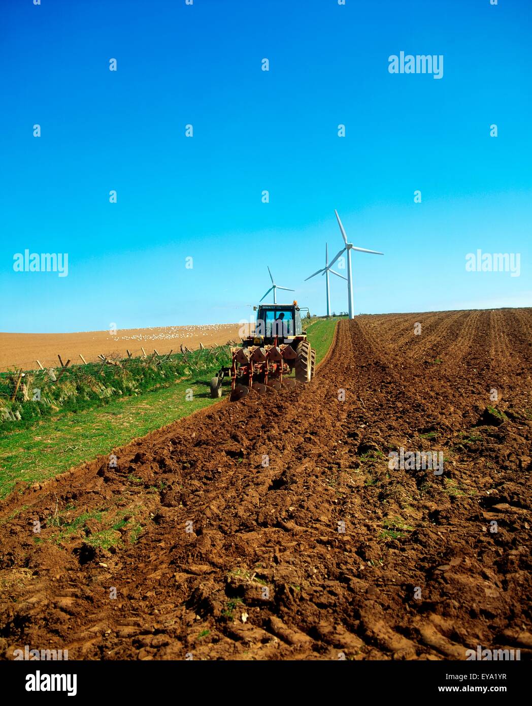 Tractors fields and wind turbines hi-res stock photography and images ...