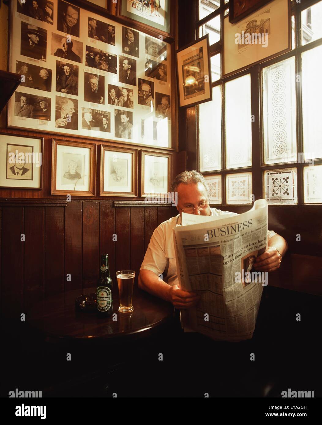 Irish men reading hi-res stock photography and images - Alamy