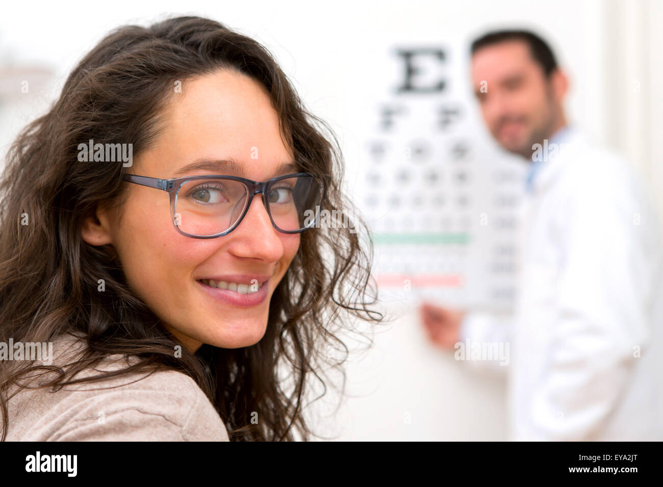 View of a Young attractive woman doing optician test Stock Photo - Alamy