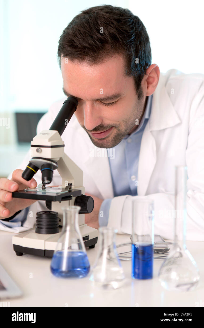 View of a scientist in a lab Stock Photo - Alamy