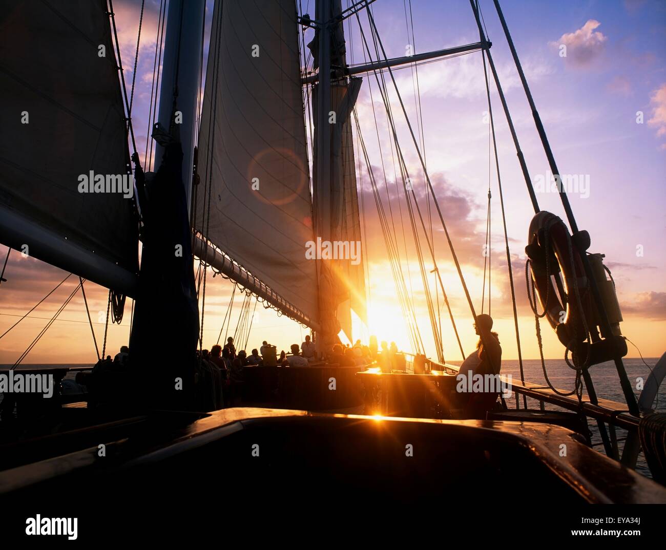 Sailing On Tall Ship, At Sunset Stock Photo - Alamy