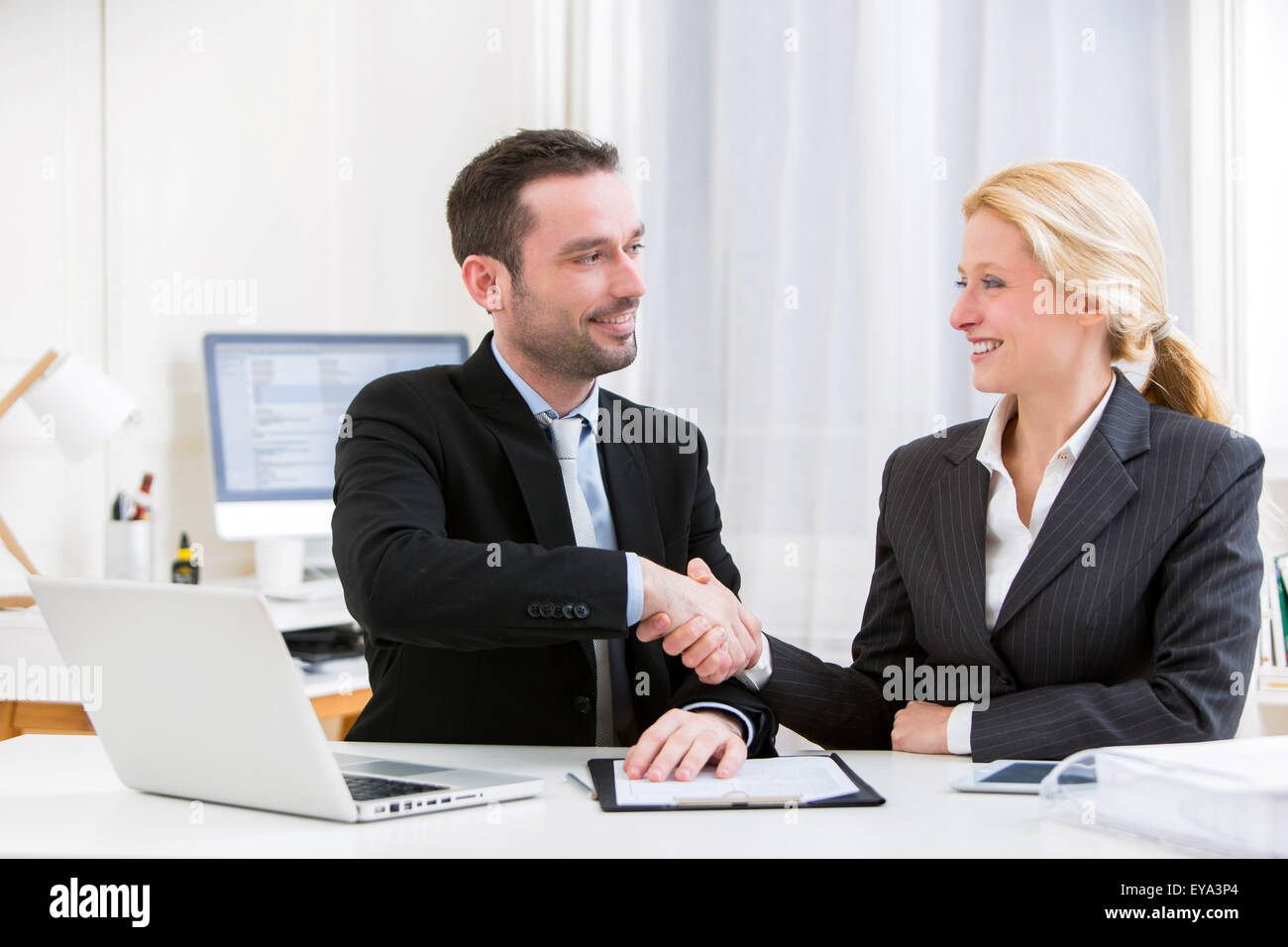 View of 2 Business man finalising agreement at the office Stock Photo ...