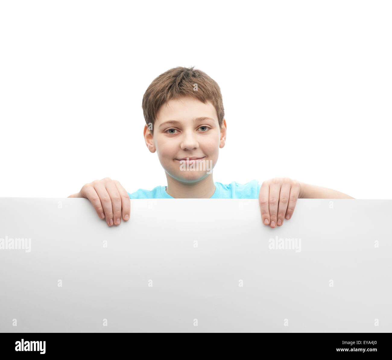 Happy young boy with a sheet of paper Stock Photo - Alamy
