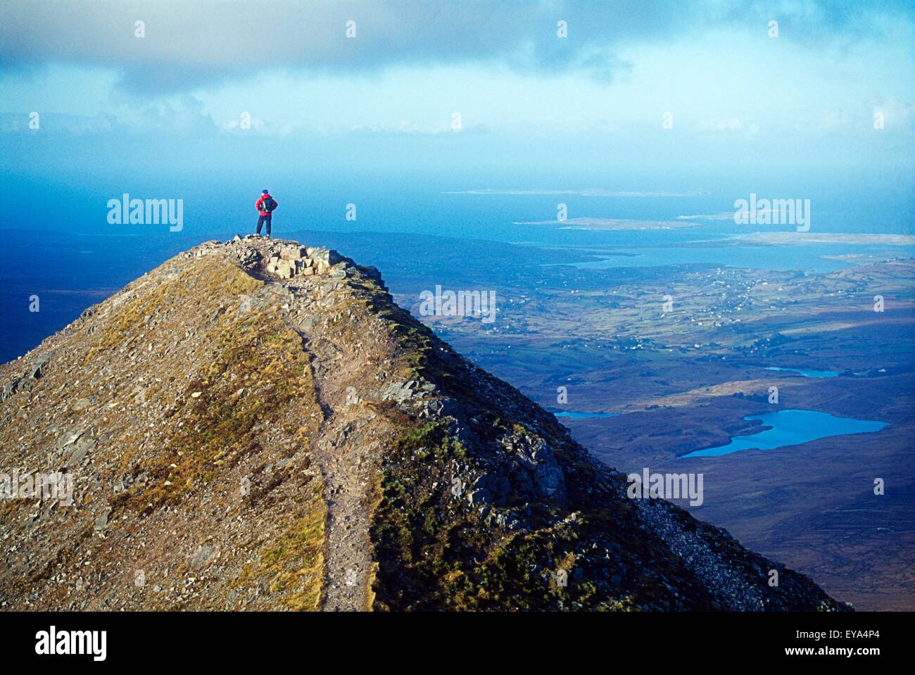 Mount Errigal, County Donegal, Ireland; Hiker On A Mountain Summit ...