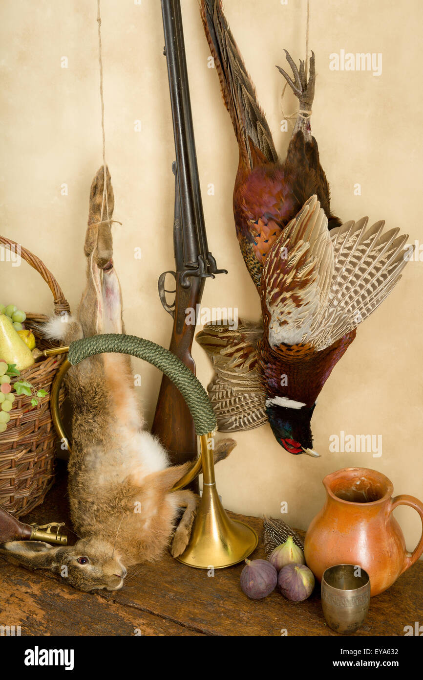 Autumn still life with hunting rifle, pheasant and hare Stock Photo - Alamy