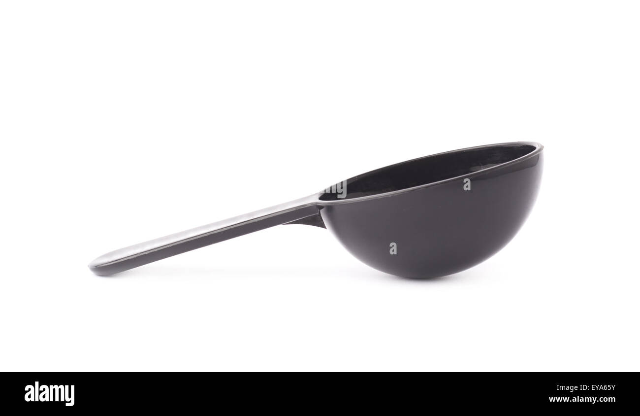 Black plastic measure spoon isolated Stock Photo - Alamy