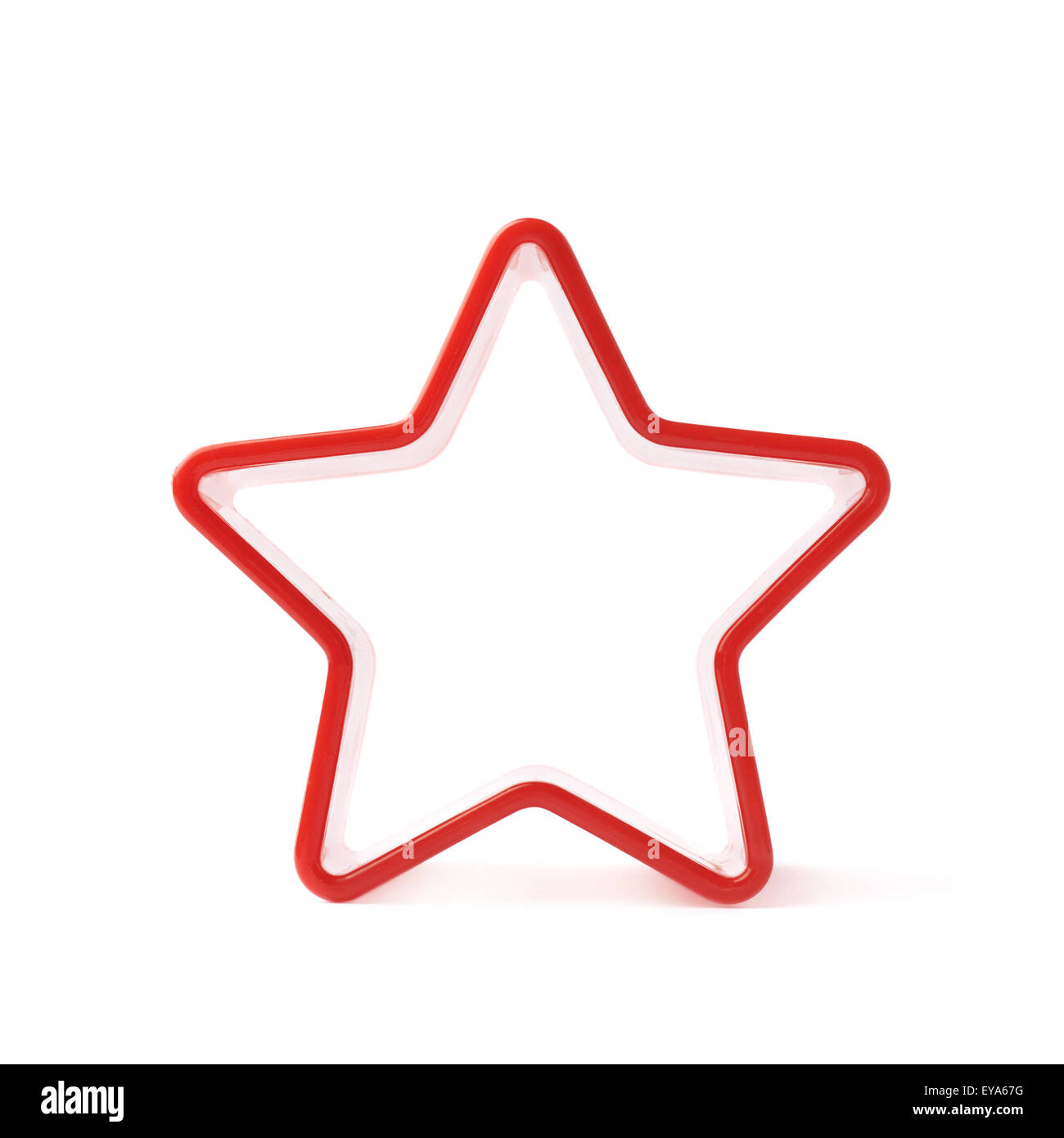 Red star shaped baking mold form Stock Photo - Alamy