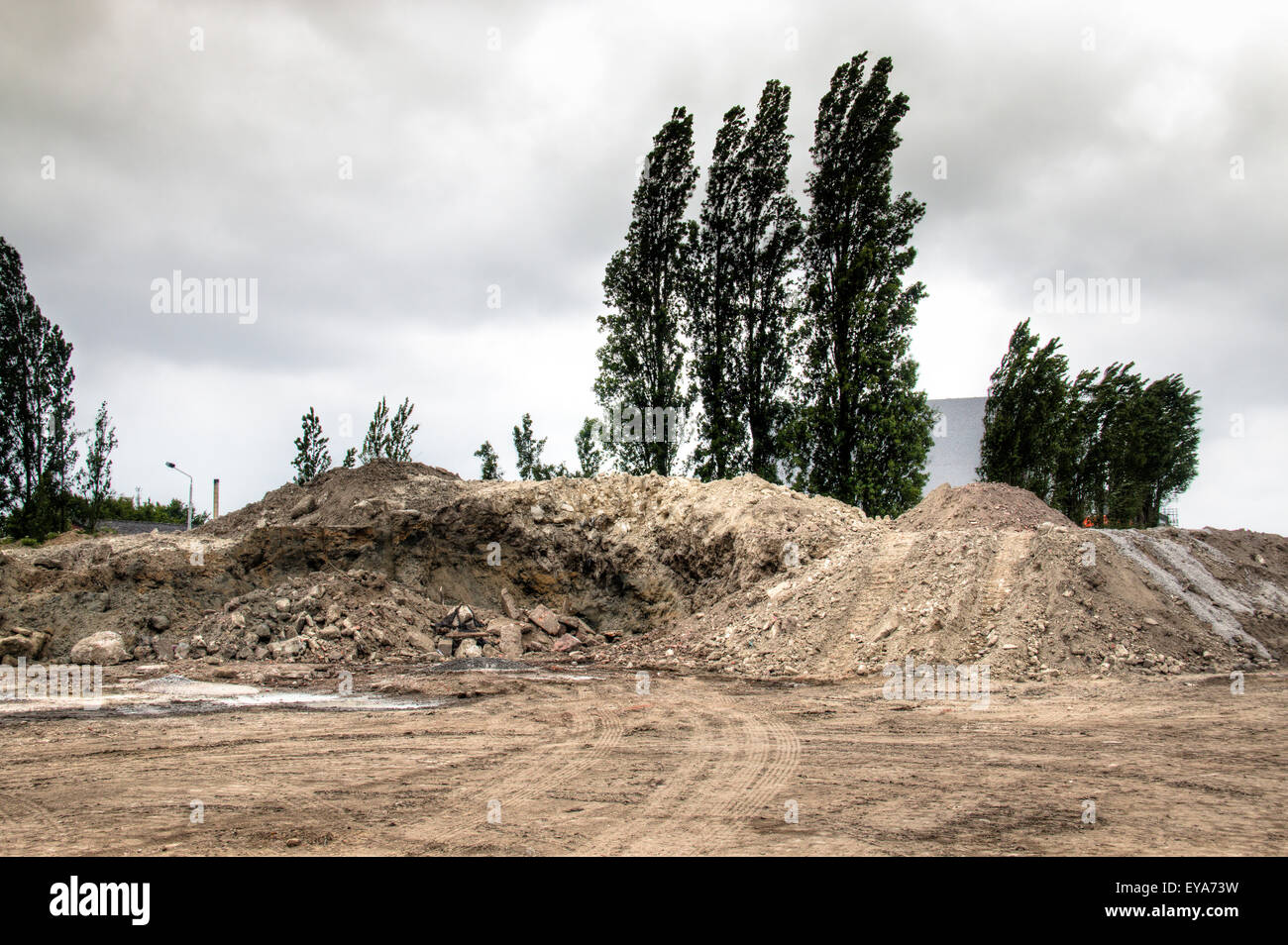 Piles of sand and dirt at construction works Stock Photo - Alamy