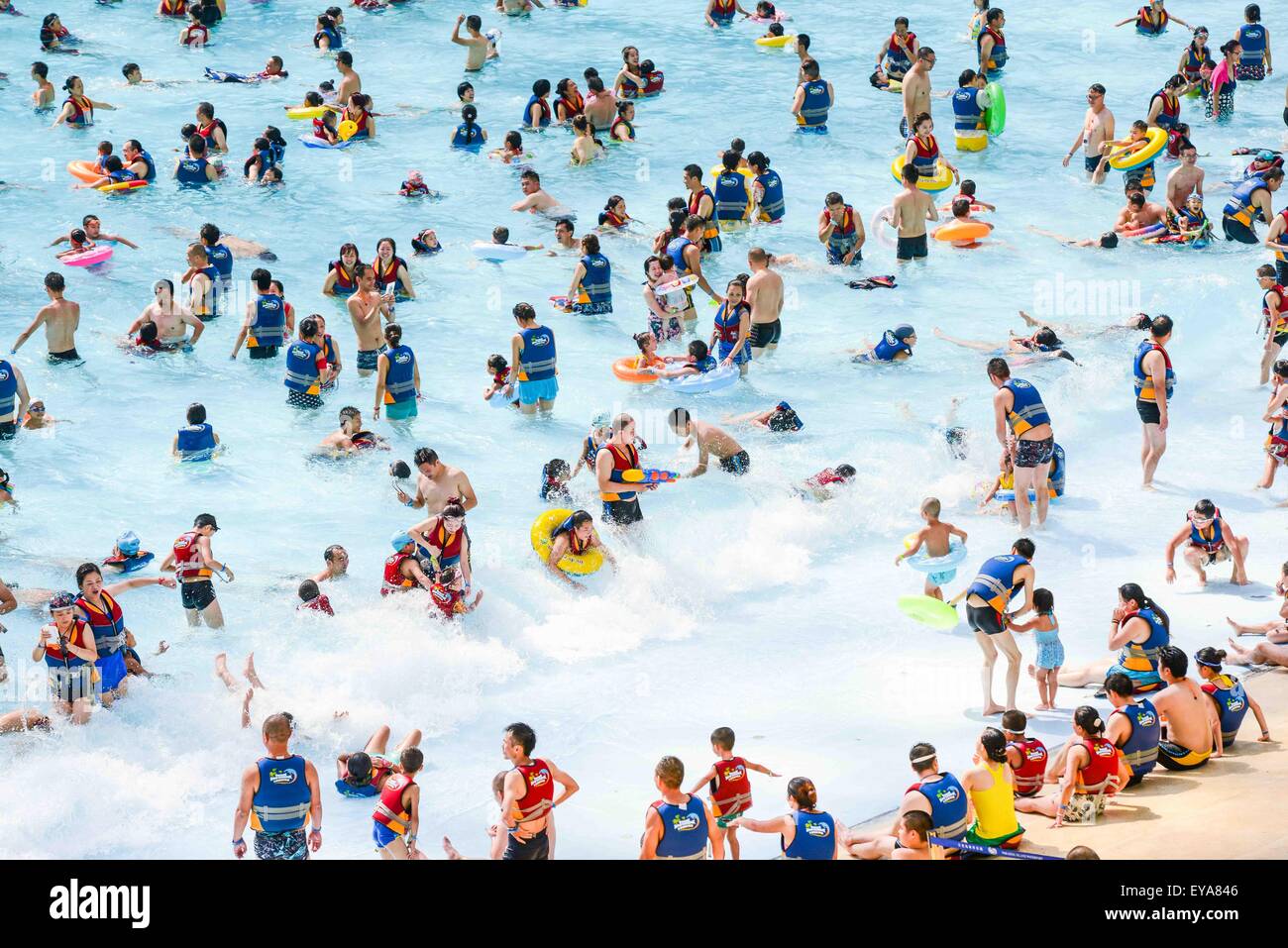 Chengdu, China's Sichuan Province. 25th July, 2015. People swarm into a ...