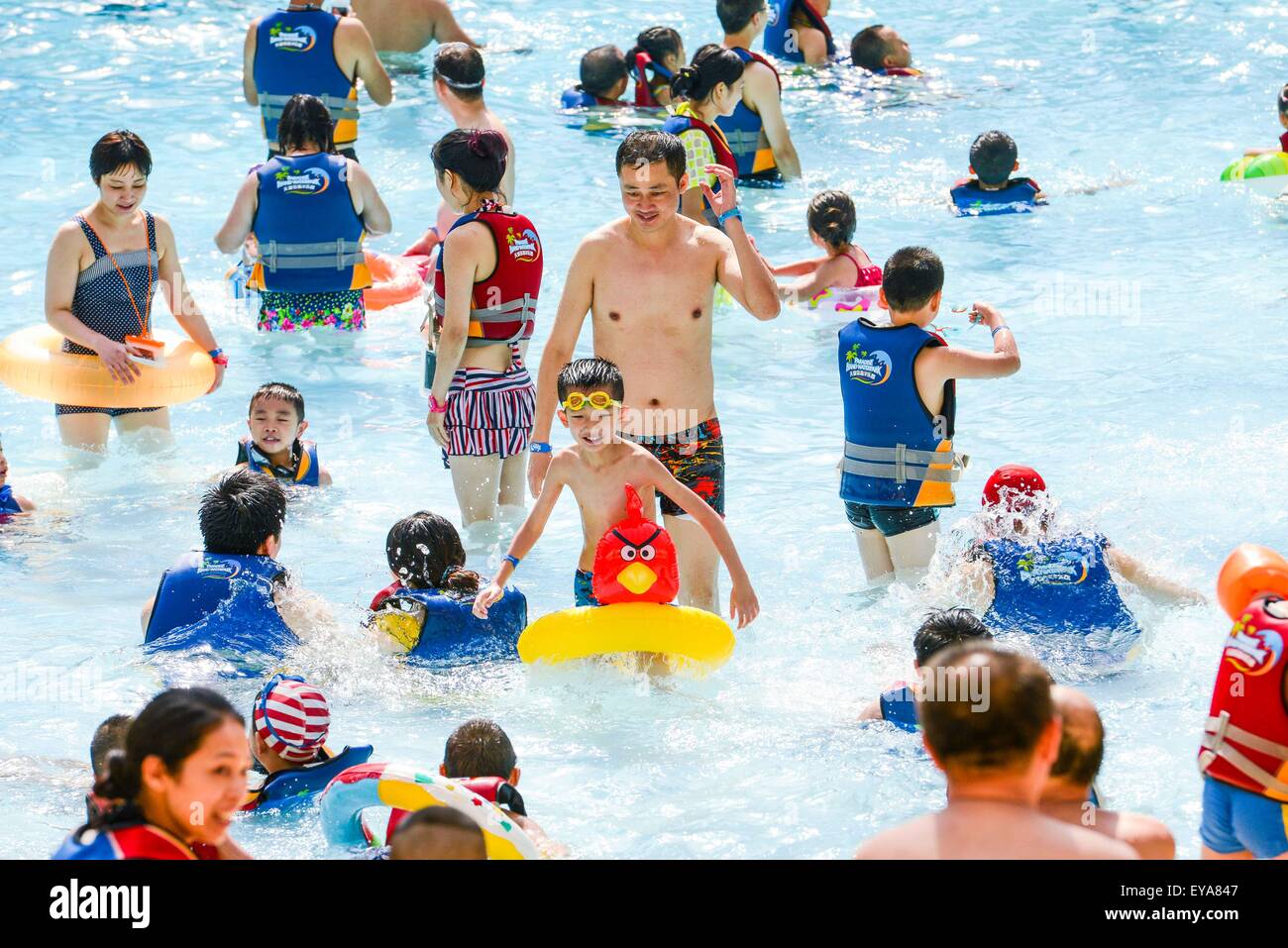Chengdu, China's Sichuan Province. 25th July, 2015. People swarm into a ...