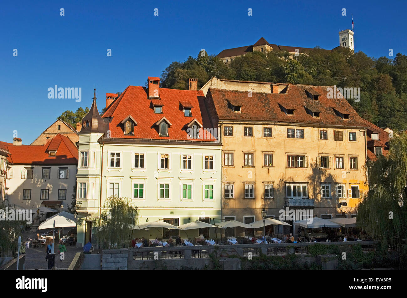 Riverfront Buildings With Castle Hill In Background, Ljubljana,Slovenia ...