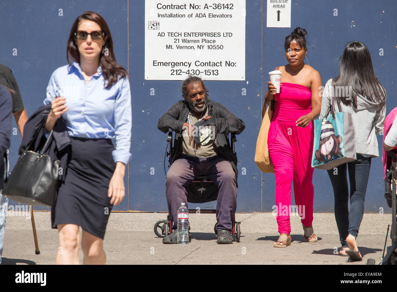 Beggar in wheelchair hi-res stock photography and images - Alamy