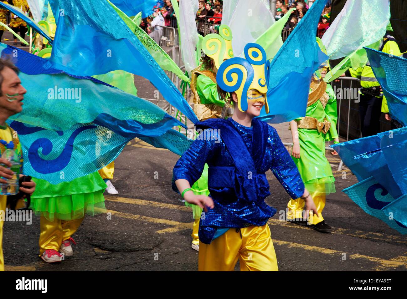 Dublin, Ireland; People In Costumes In A Parade On O'connell Street ...