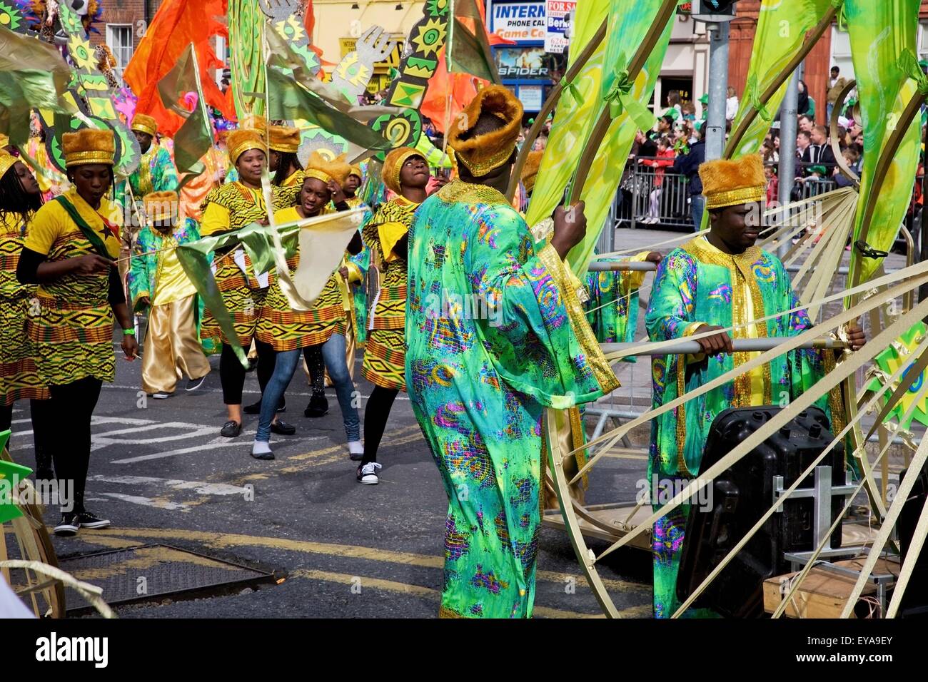 Dublin, Ireland; People In Costumes In A Parade On O'connell Street ...
