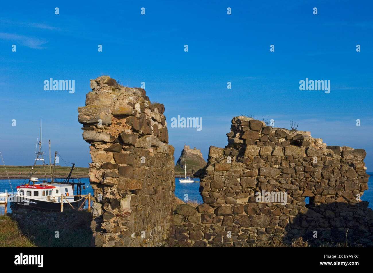 Lindesfarne Castle Seen Through Breach In Stone Wall, Holy Island ...