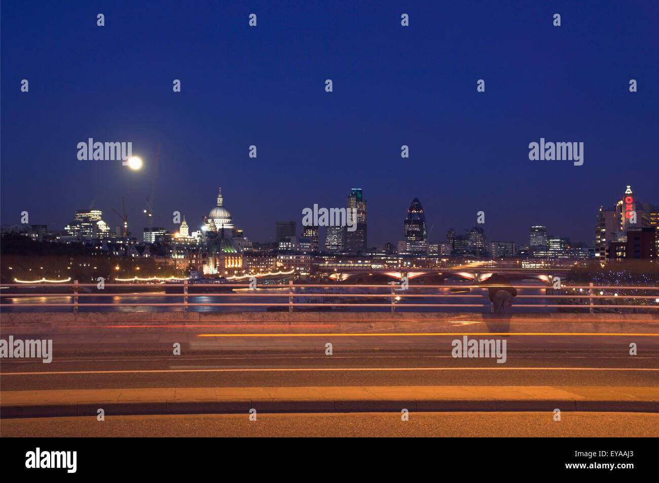 Skyline At Dusk With Moon With Waterloo Bridge Stock Photo - Alamy