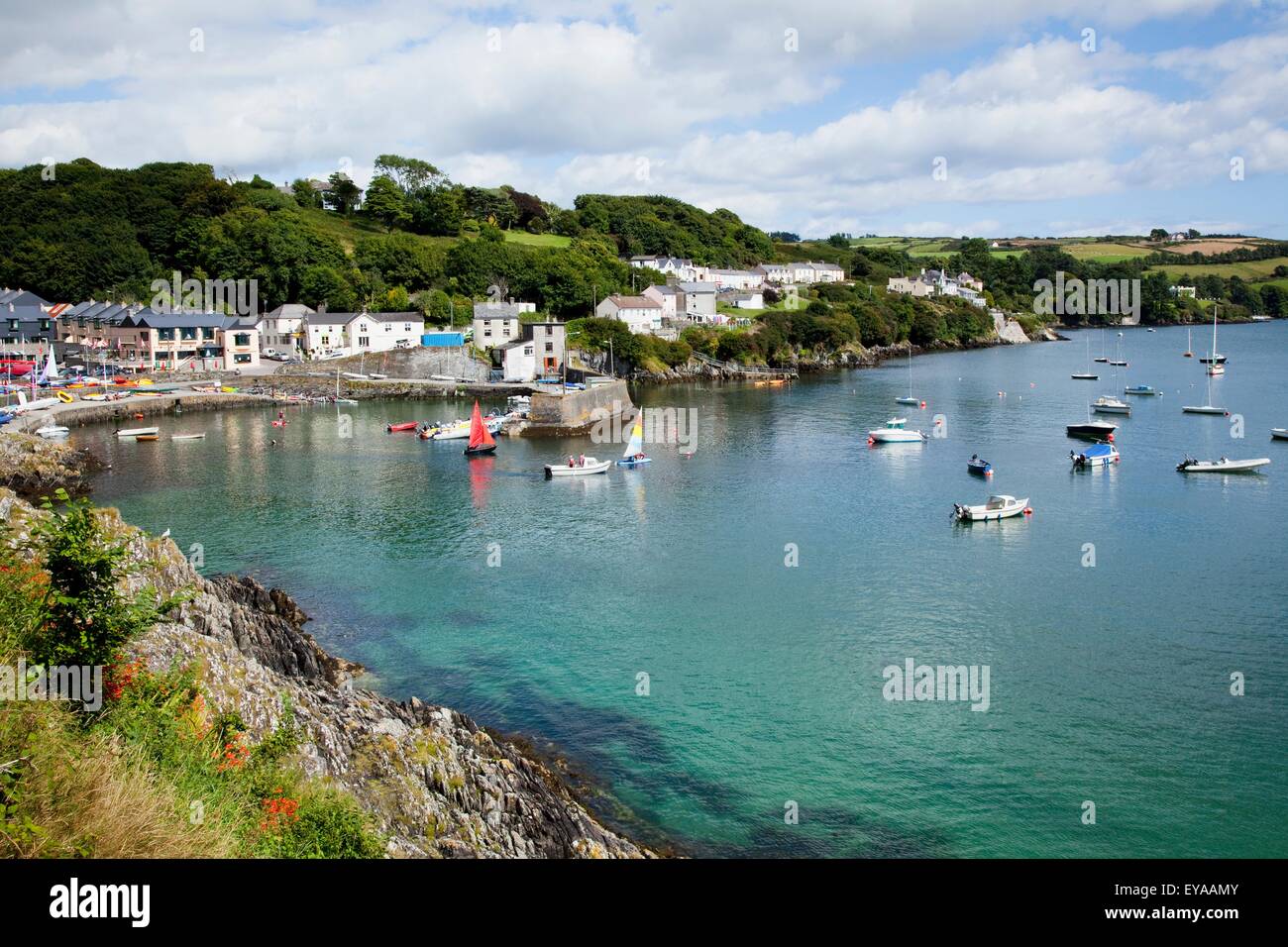 The Village Of Glandore And Boats In The Harbor; Glandore, County Cork ...