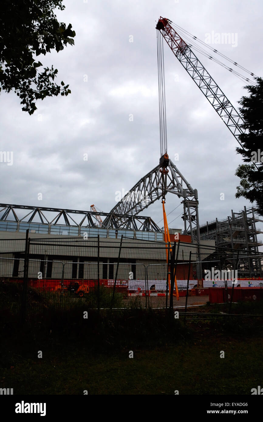 Liverpool, UK. 24th July, 2015. Anfield Redevelopment. Giant cranes ...