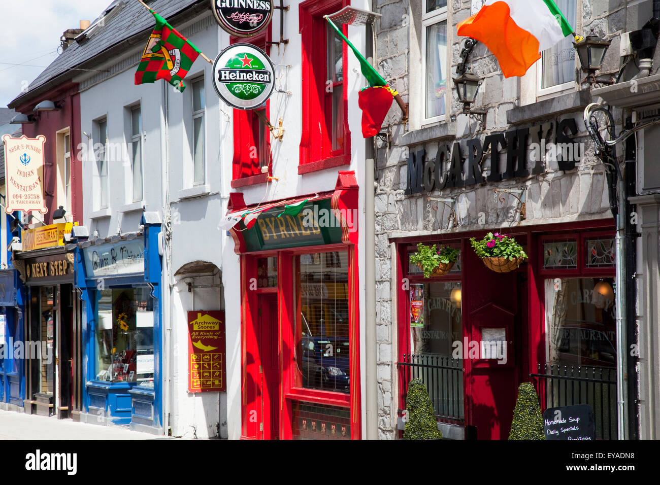 Shops In A Row Painted In Bright Colours; Castlebar, County Mayo ...